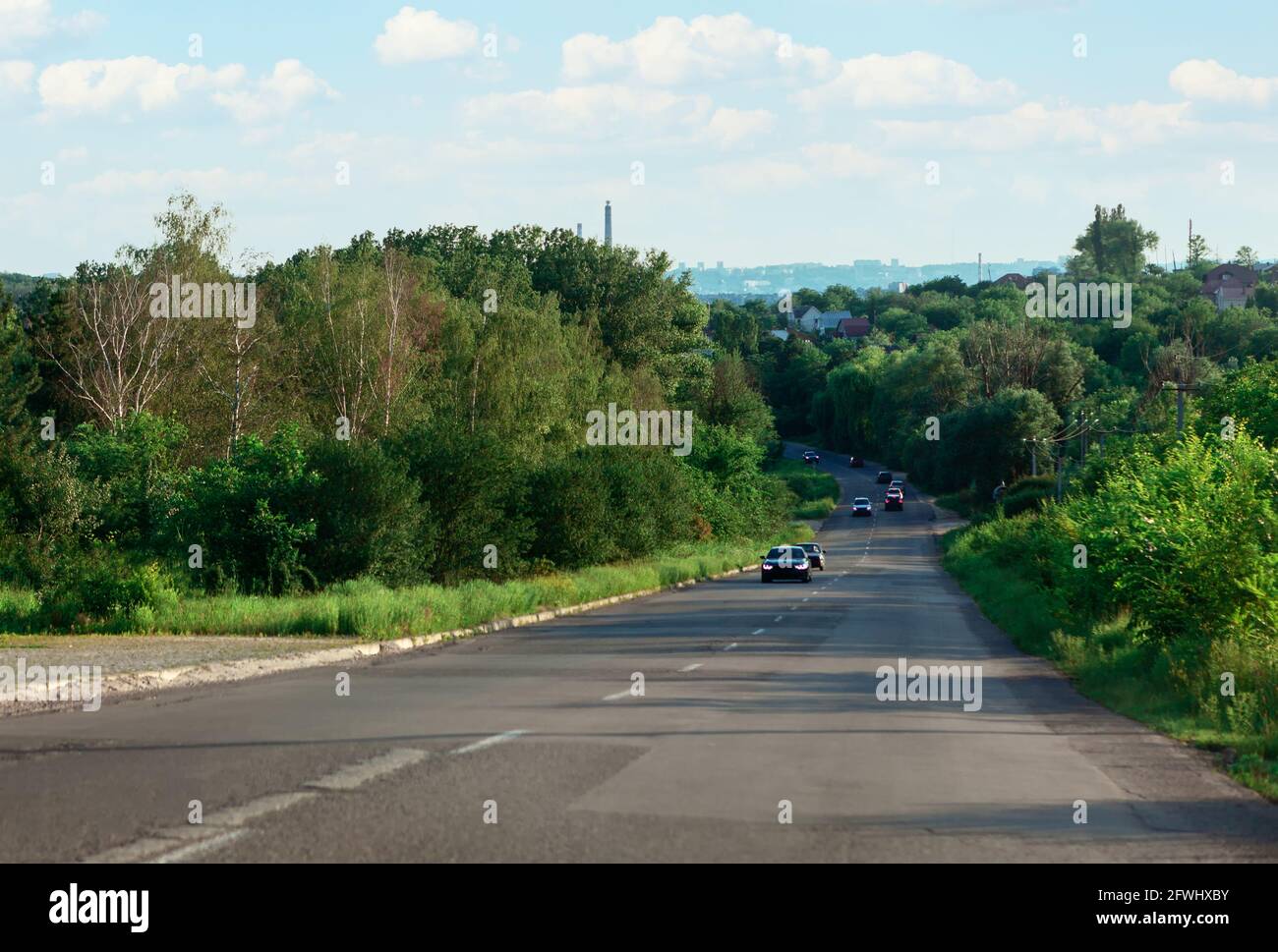 Traffic of Suburban road . Cars on the asphalt road Stock Photo - Alamy