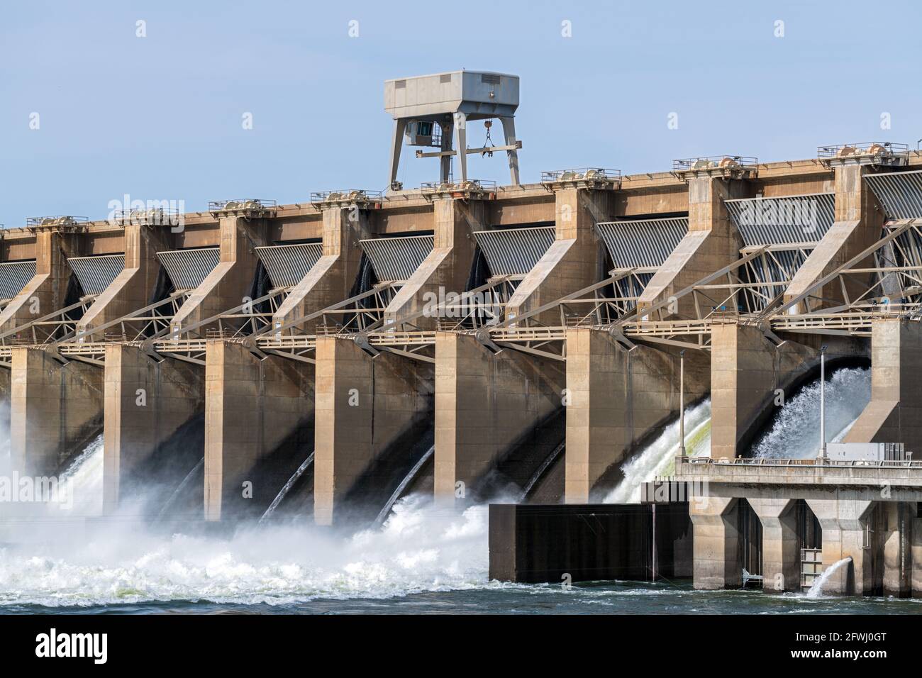 A crane sits on top of the spillway at the Ice Harbor Dam on the Snake ...