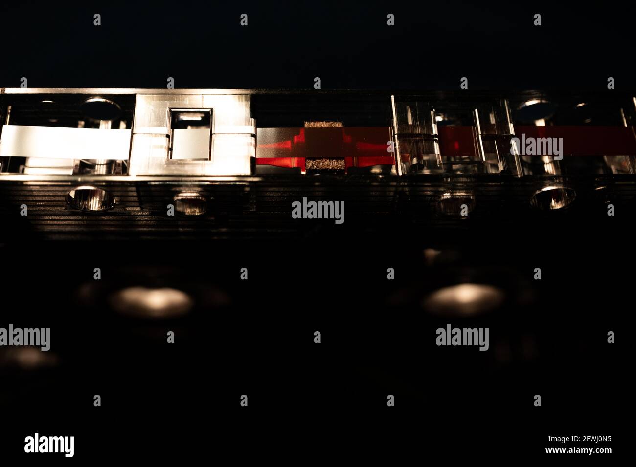 Macro Closeup of Red Tape on Bottom of Upside Down See Through ...