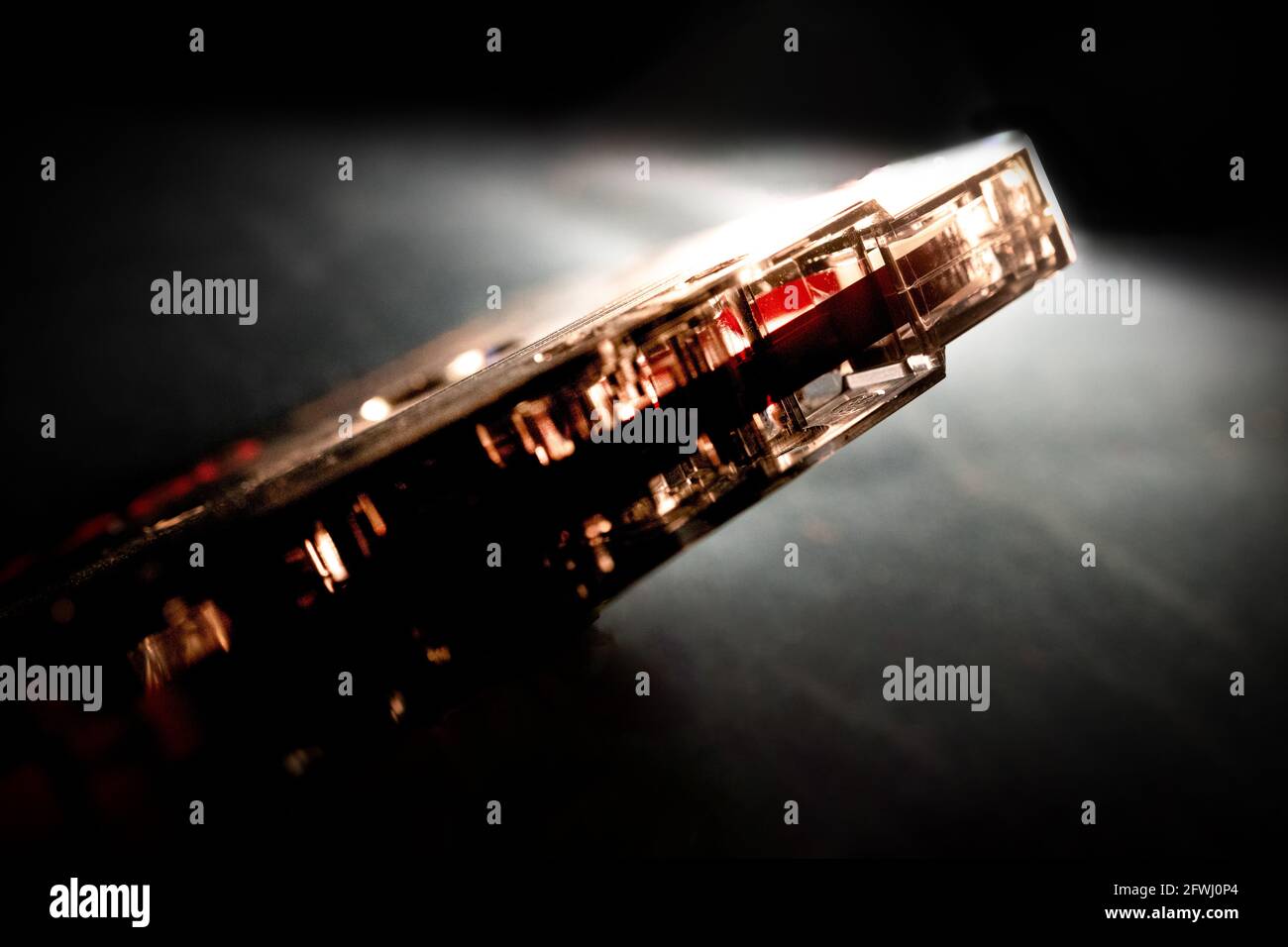 Minimalist Closeup of Red Tape on Bottom of Angled Clear Cassette Stock ...