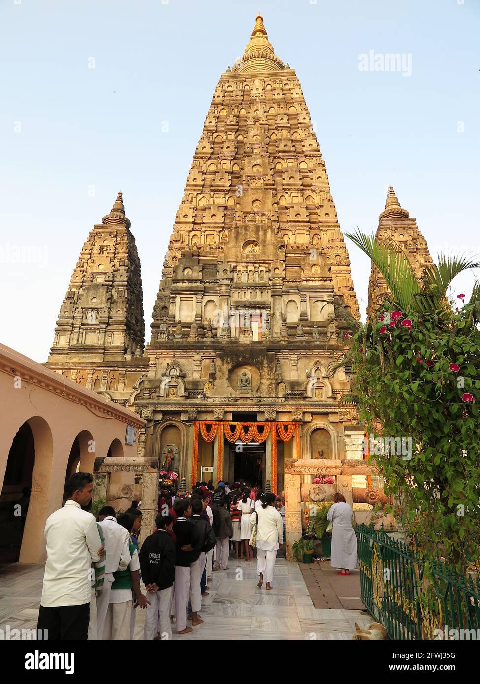 Visitors lining up to enter the shrine hall in the central pyramidal ...