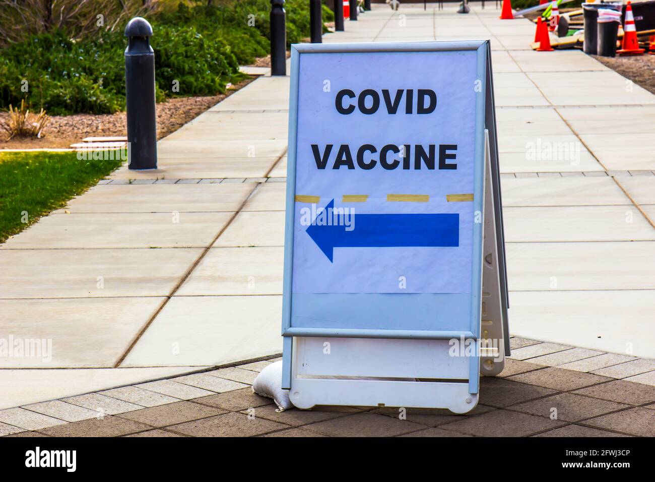 Covid 19 Vaccination A-Frame Directional Sign Stock Photo - Alamy