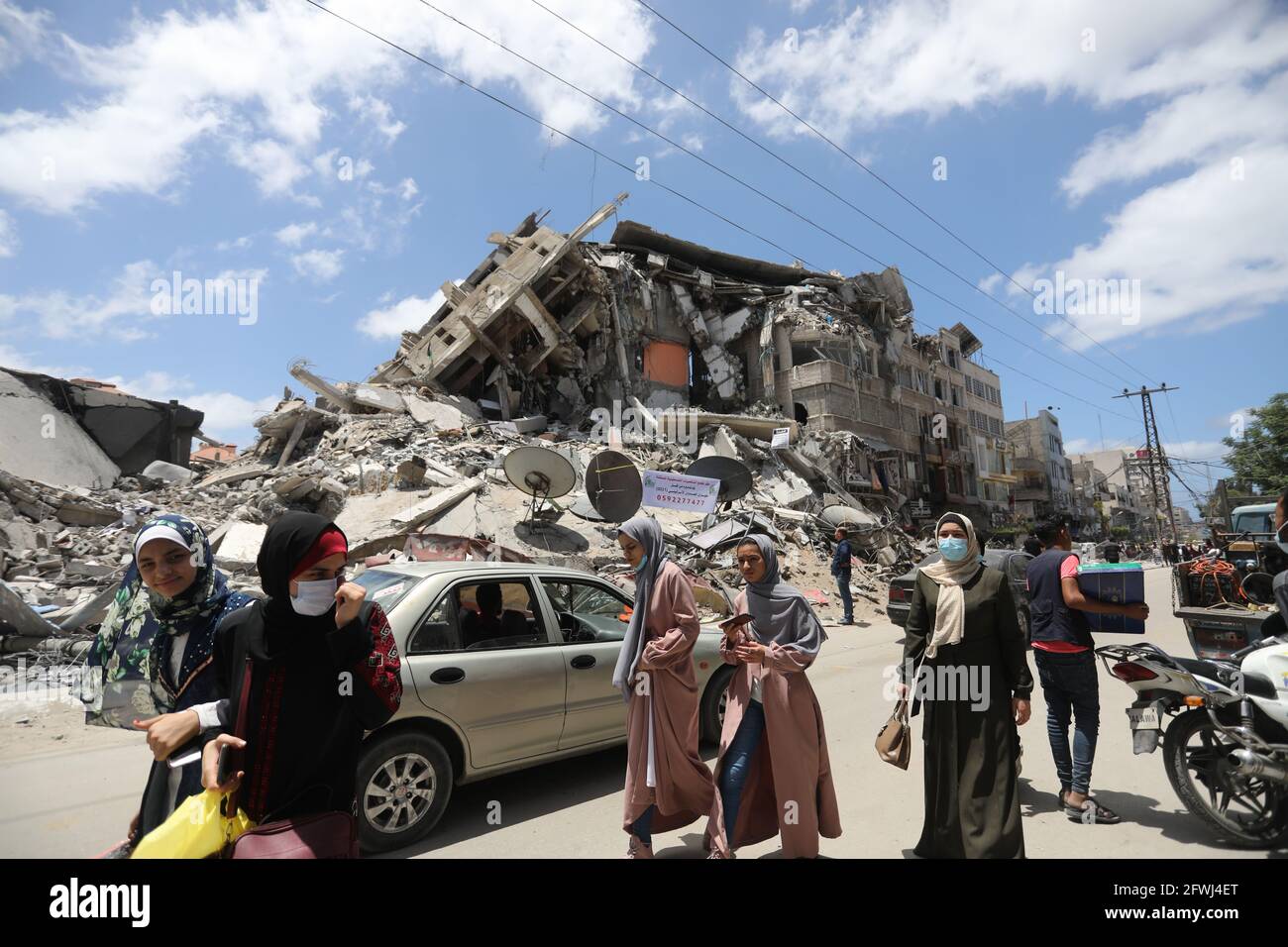 Gaza, Palestine. 1st Jan, 2000. Palestinian women walk near the rubble ...