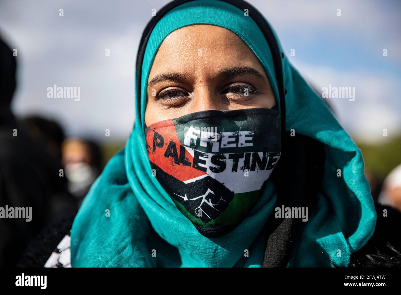 London, UK. 22nd May, 2021. Palestinian supporter wearing a “Free ...