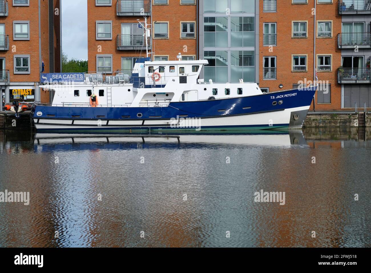 Sea Cadets training ship moored in the main basin of Gloucester Docks ...