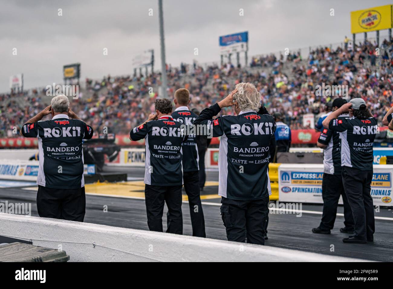 Baytown, Texas, USA. 22nd May, 2021. Funny Car Alexis DeJoria pit crew ...