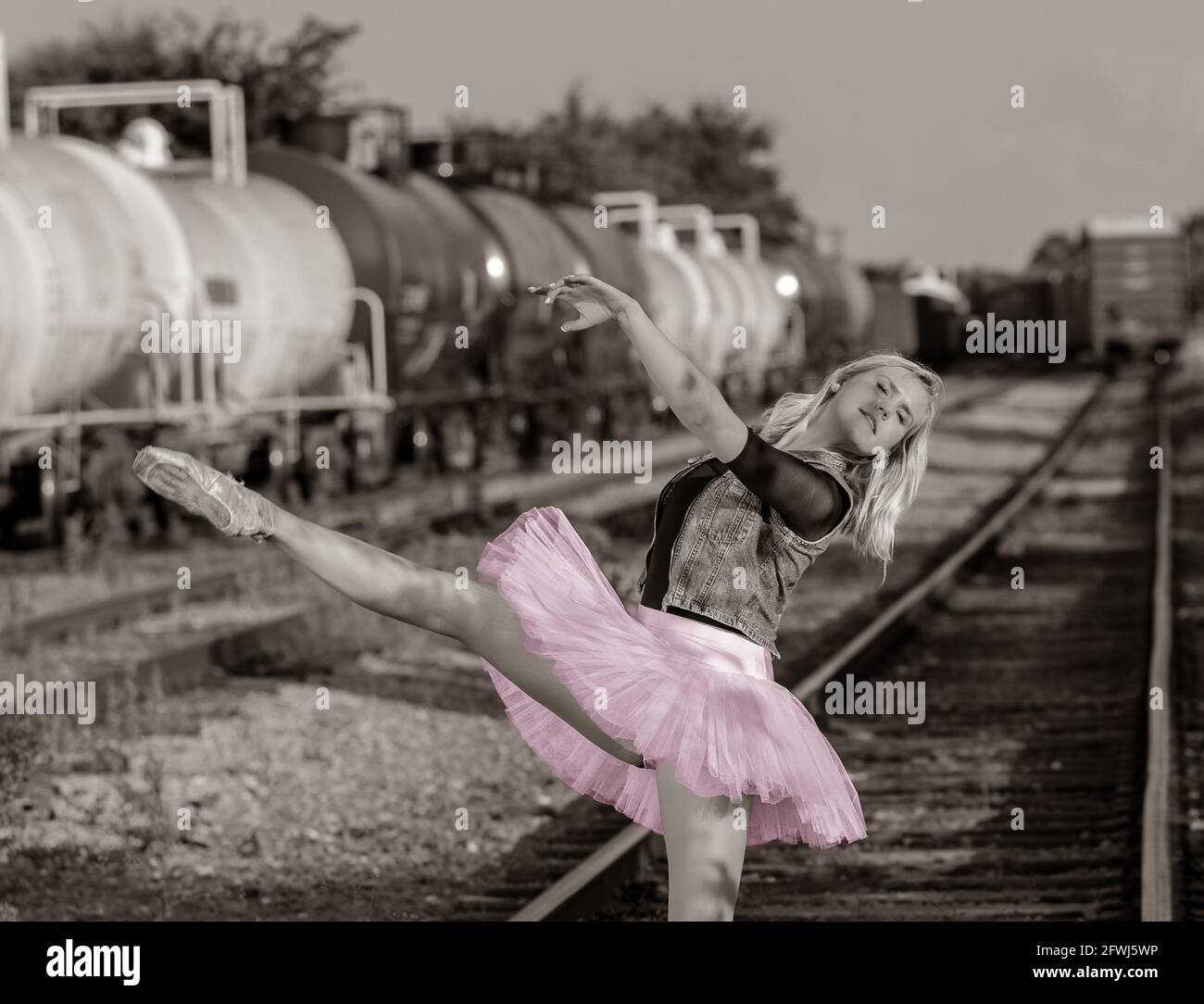 Beautiful girl on train tracks hi-res stock photography and images - Alamy