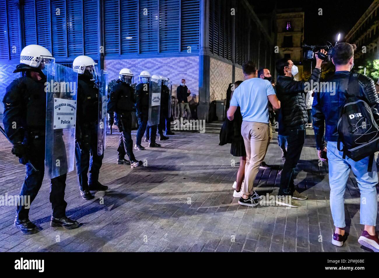 Police officers breaks up the party crowd in the Born nightlife area ...