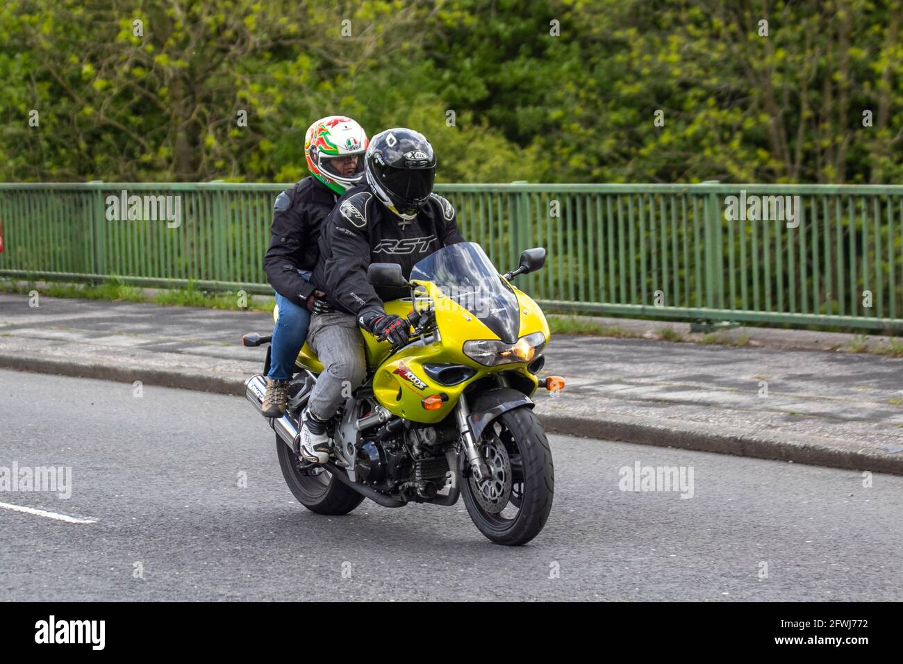 2000 gold Suzuki; Motorbike rider; two wheeled transport, motorcycles ...