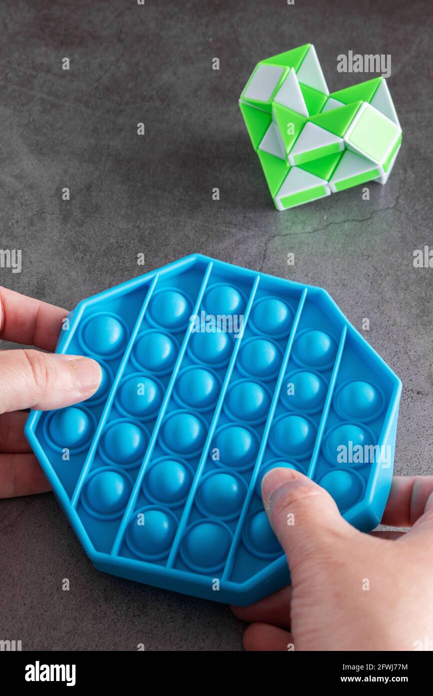 Fidget toy pop it toy Stock Photo - Alamy