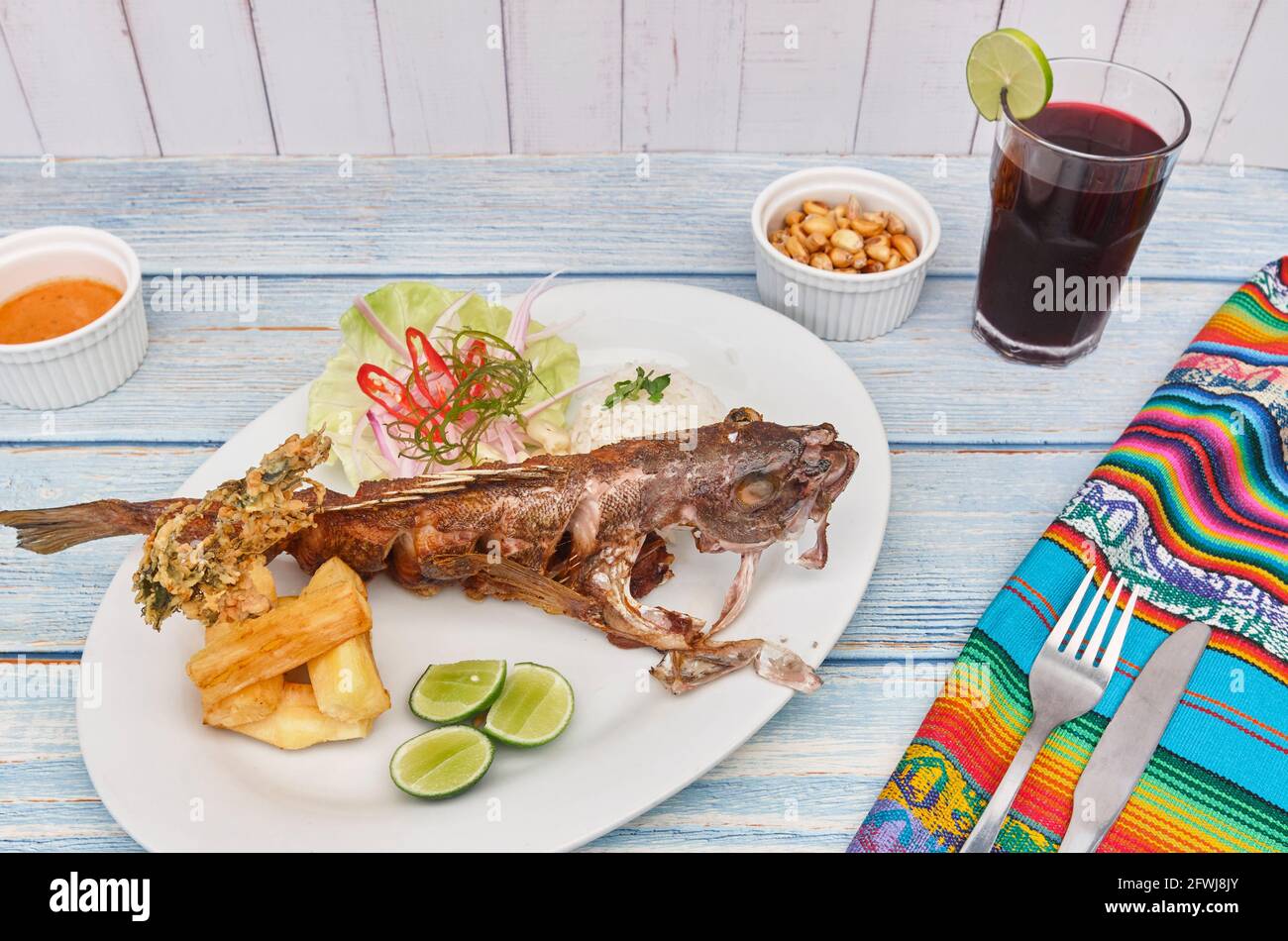 Peruvian cuisine: Cabrilla frita, fried fish . Selective Focus Stock ...