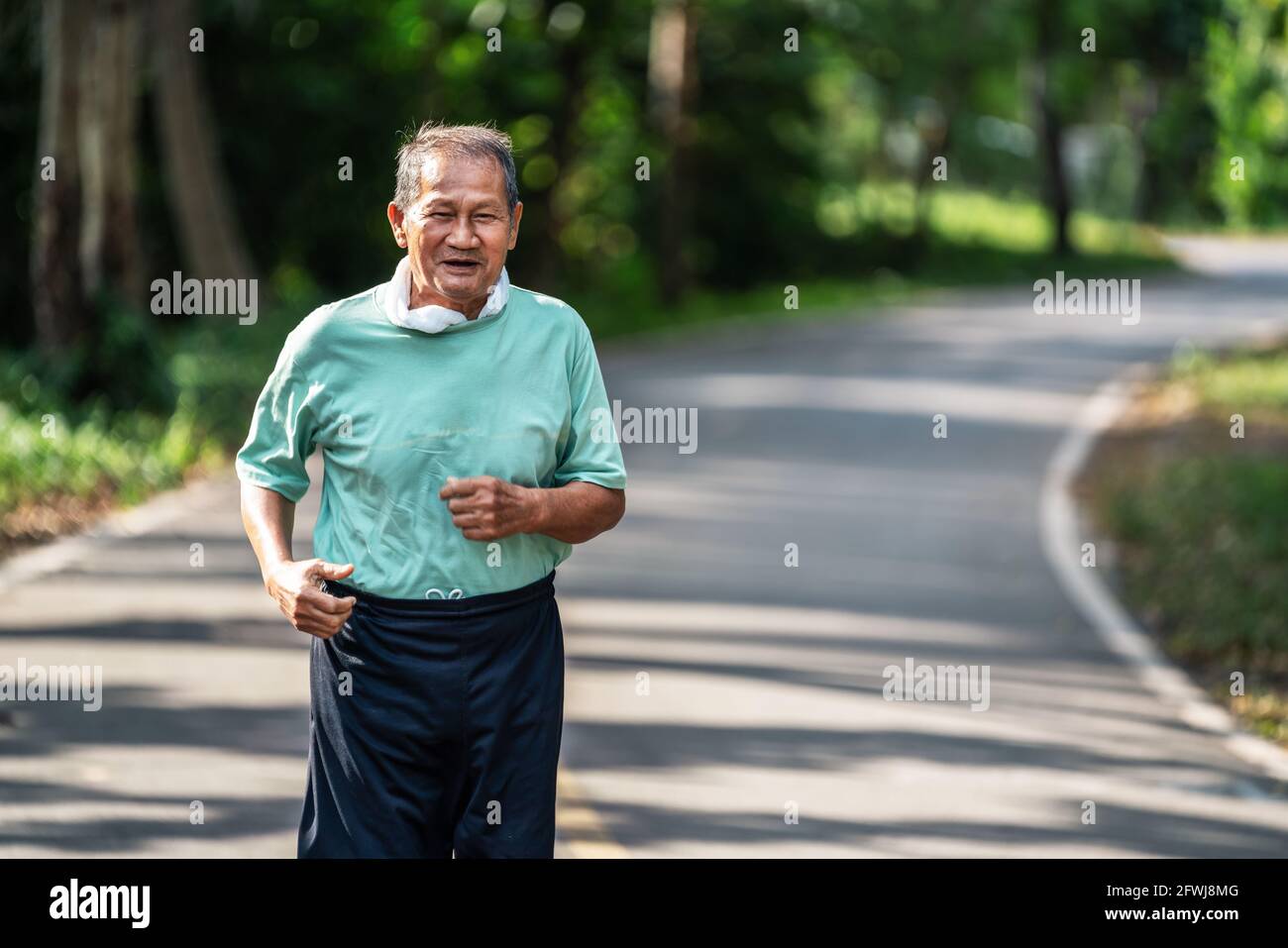 Asian old man jogging hi-res stock photography and images - Alamy