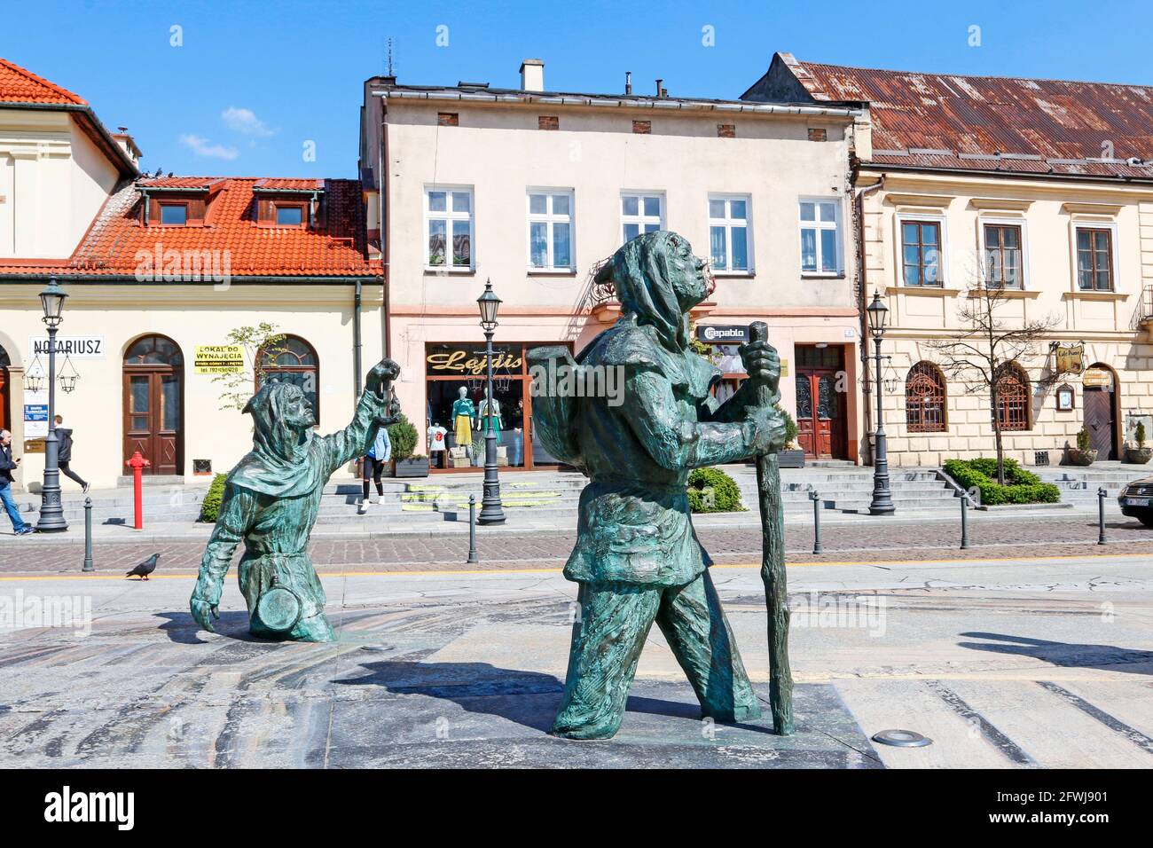 Monument of medieval salt mine worker at the main market square in ...