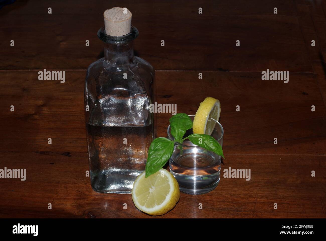 Typical spanish bottle with glass Stock Photo - Alamy
