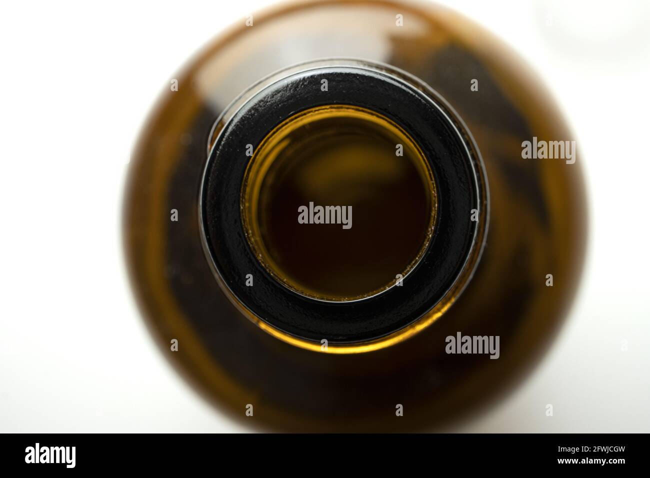 Macro Photo of Top of the Brown Bottle Taken From Above on White ...