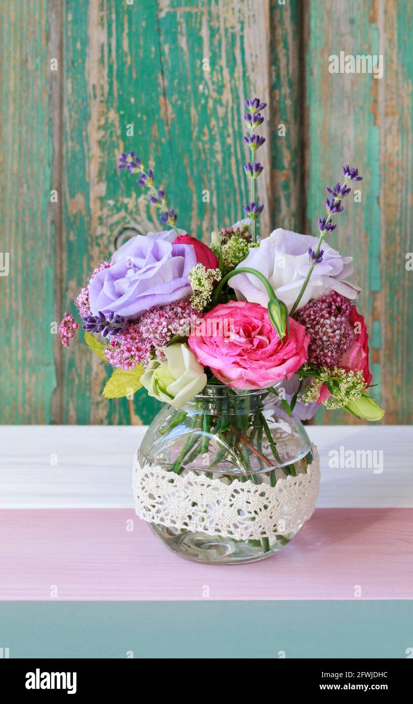 Bouquet with rose, eustoma and lavender flowers. Party decor Stock ...