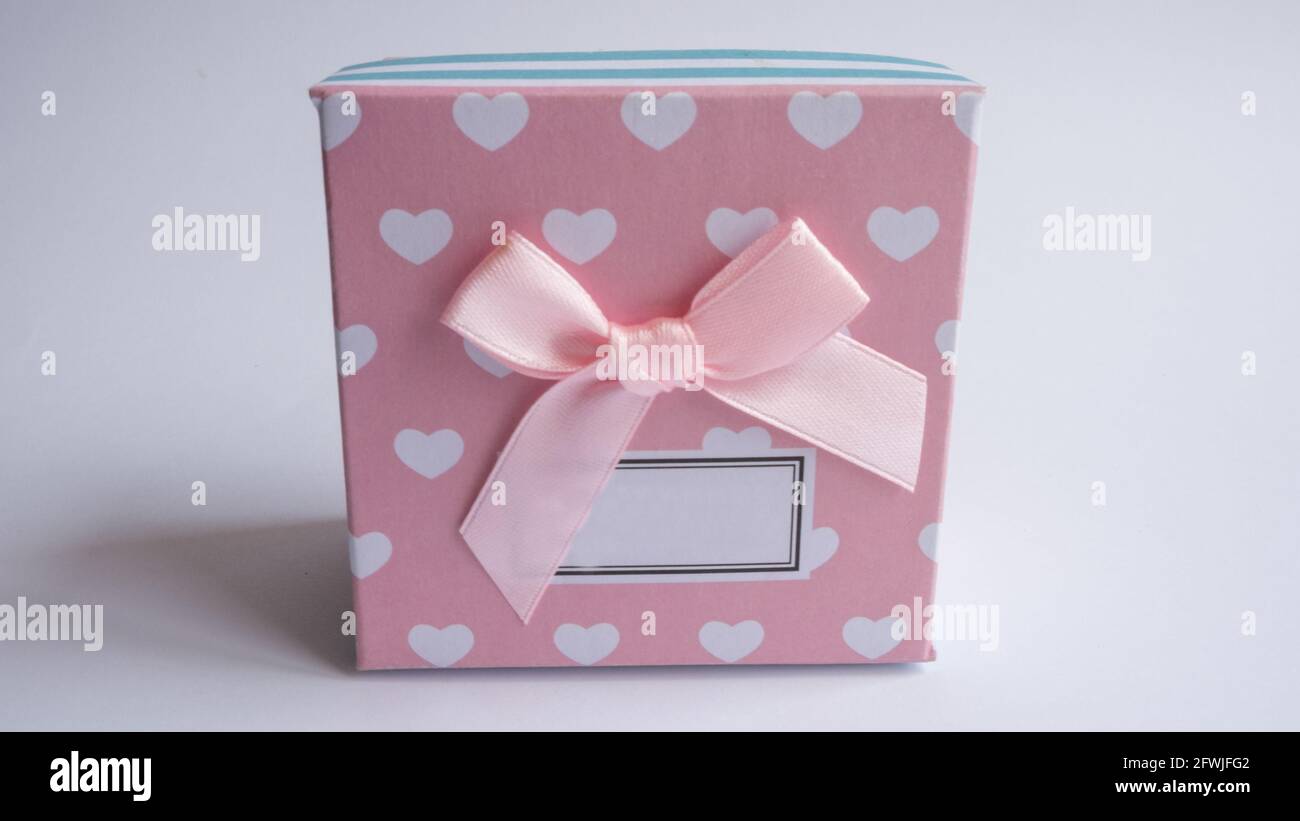 Multicolored gift box with a pink bow. Empty gift boxes on white ...