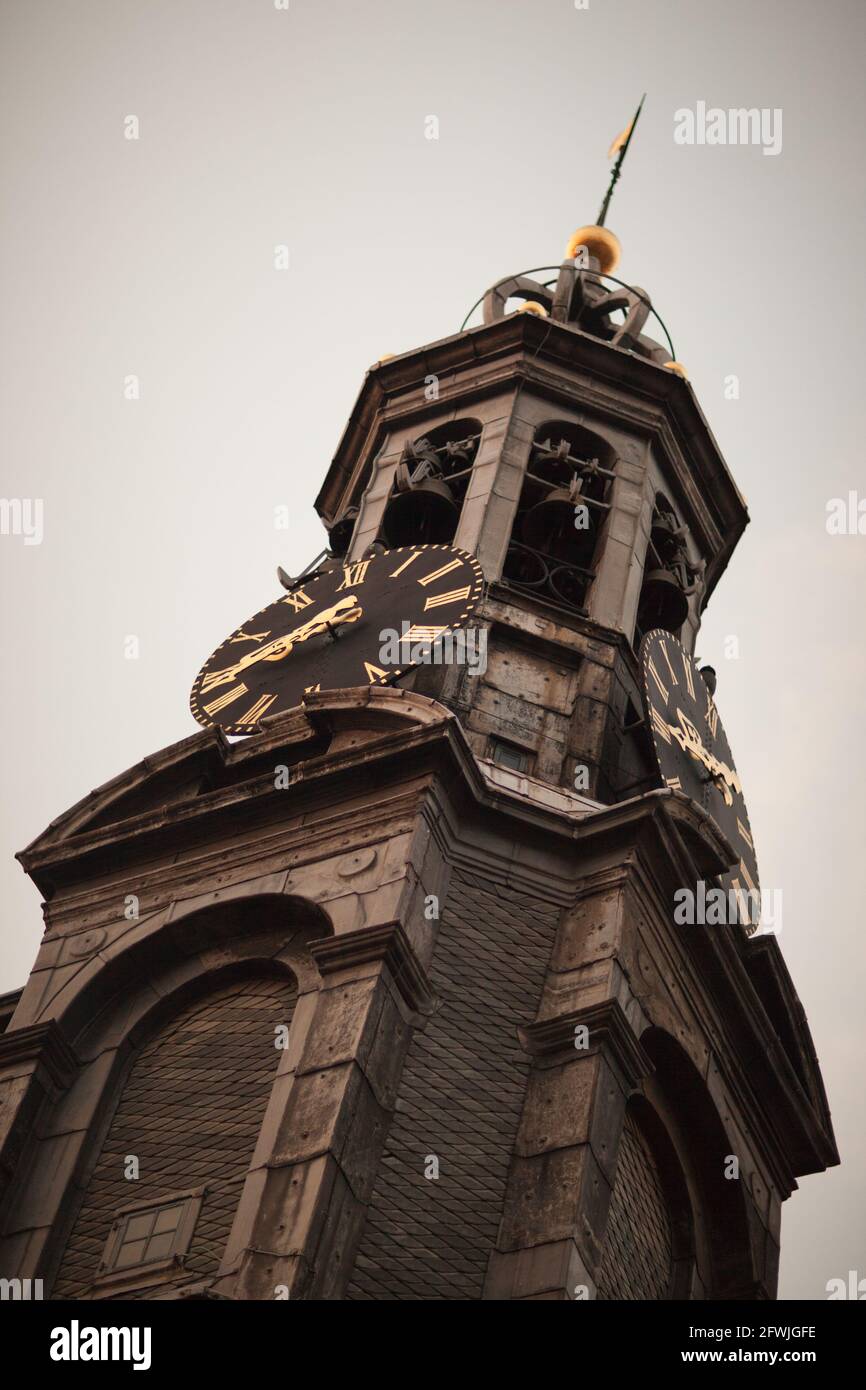 Clock tower in Amsterdam Stock Photo - Alamy