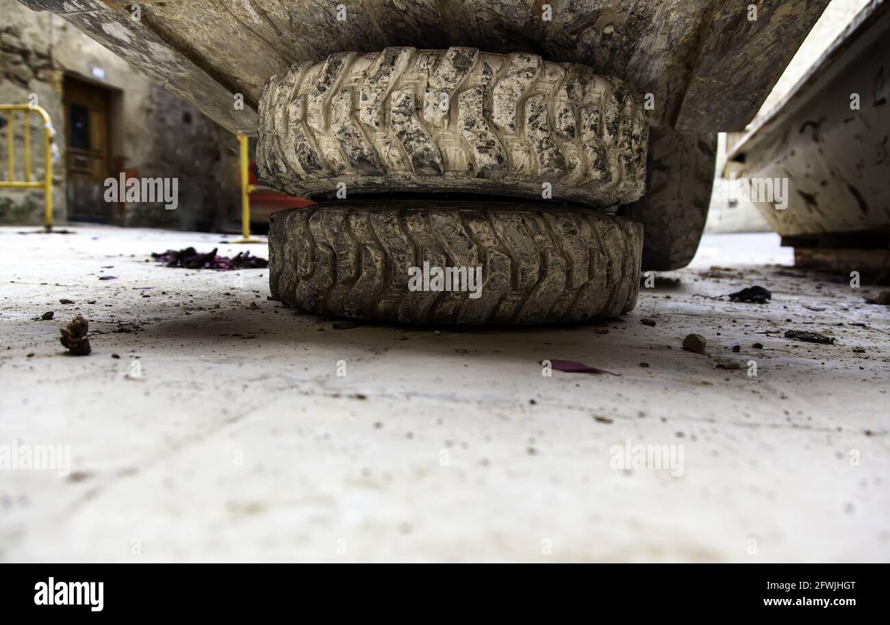 Detail of rubber wheels of a large construction machine Stock Photo - Alamy