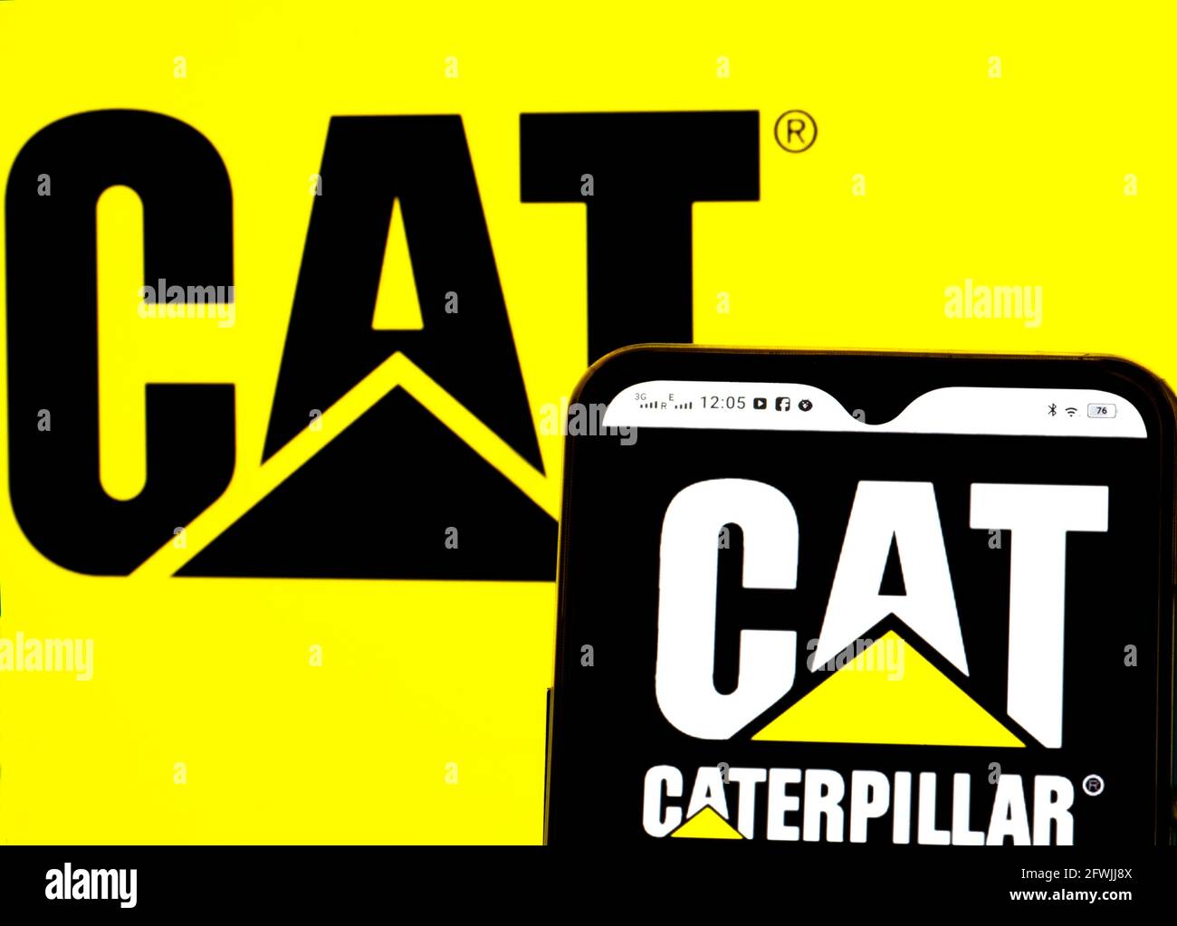 In this photo illustration Caterpillar Inc. logo seen displayed on a ...