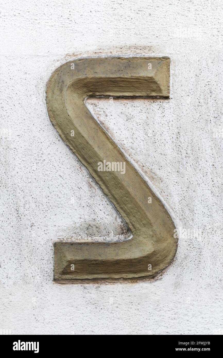 Olive green stucco capital letter S Stock Photo - Alamy