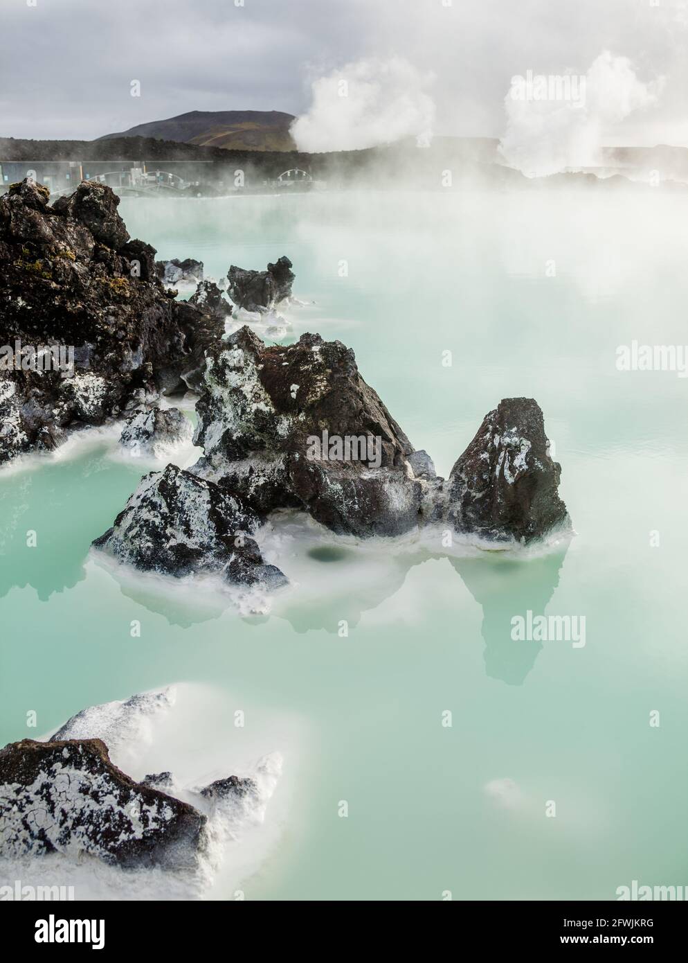 Close up of the lava rocks and hot springs mud sediment in the Blue ...
