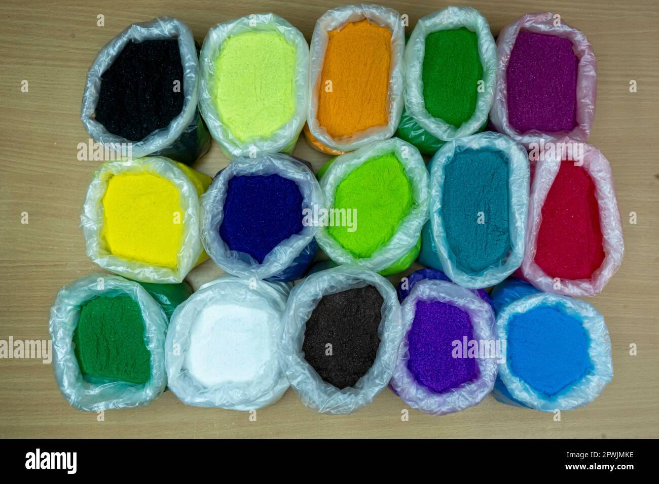 rangoli multi color in beg rangoli pouch purple black green blue white ...