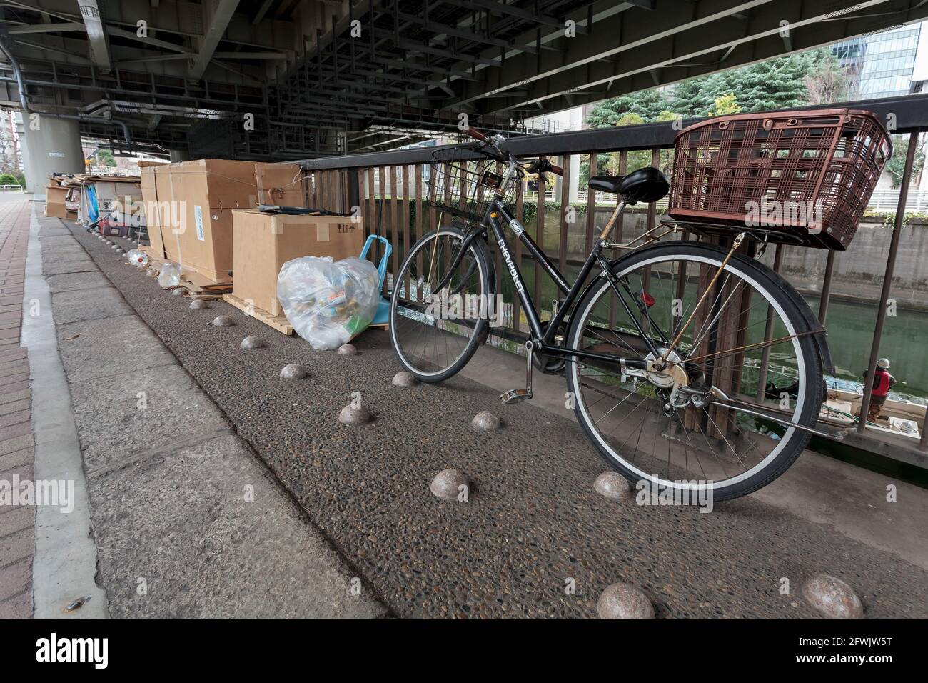 Bumps put in the ground to stop homeless people sleeping there by a ...