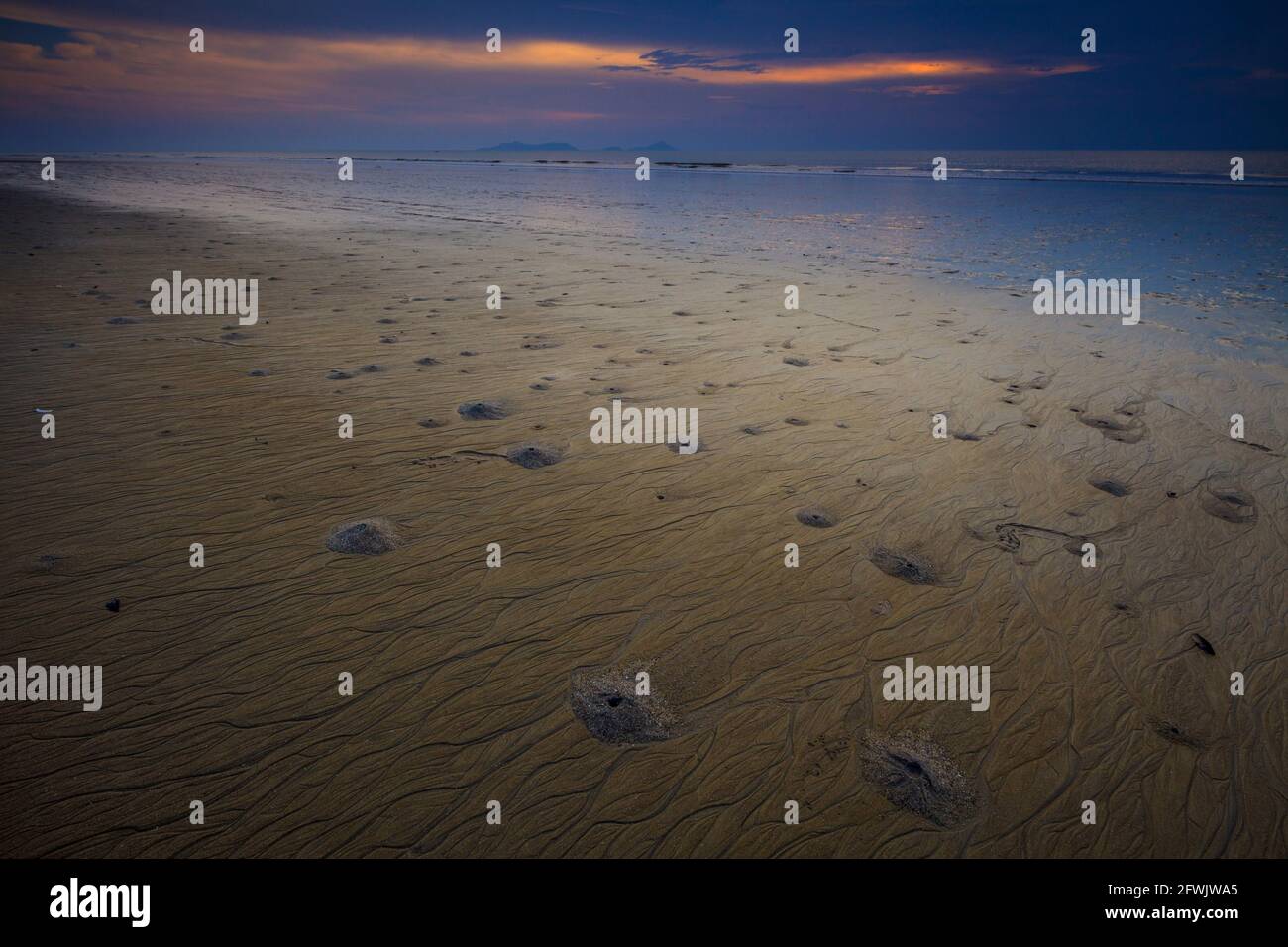 Sandy beach and low tide at dawn at Punta Chame, Pacific coast, Panama ...