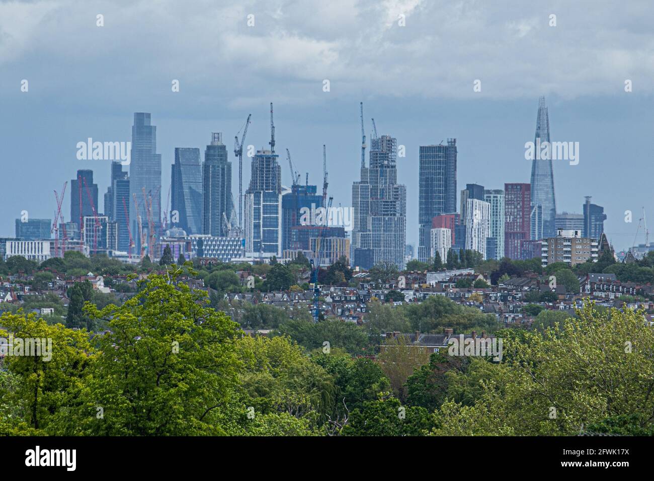 Crane higher than skyscraper hi-res stock photography and images - Alamy