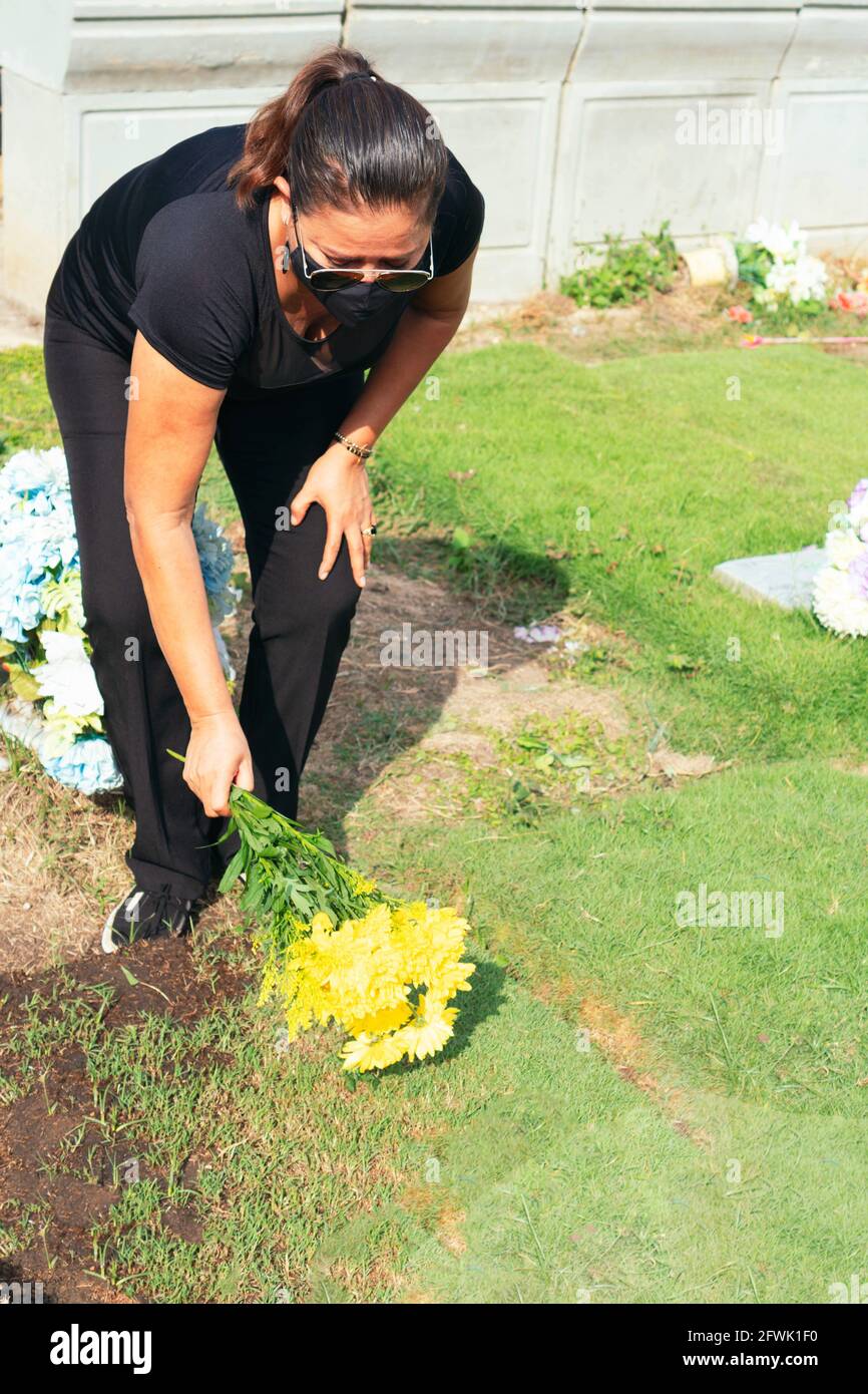 Man visiting graveyard hi-res stock photography and images - Alamy