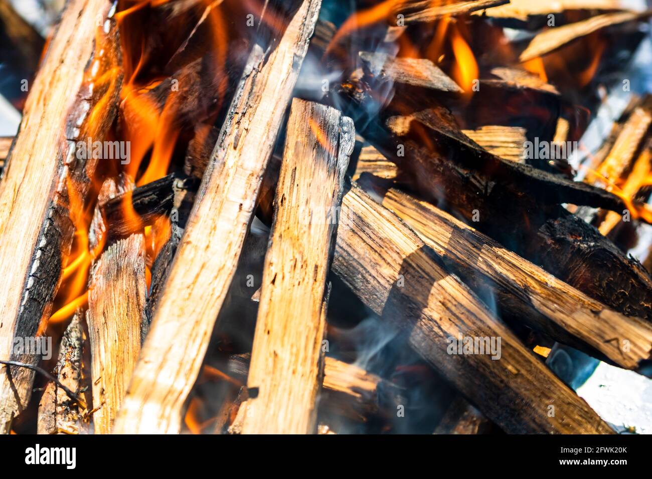 Barbecue grill pit with glowing and flaming hot open fire with red ...