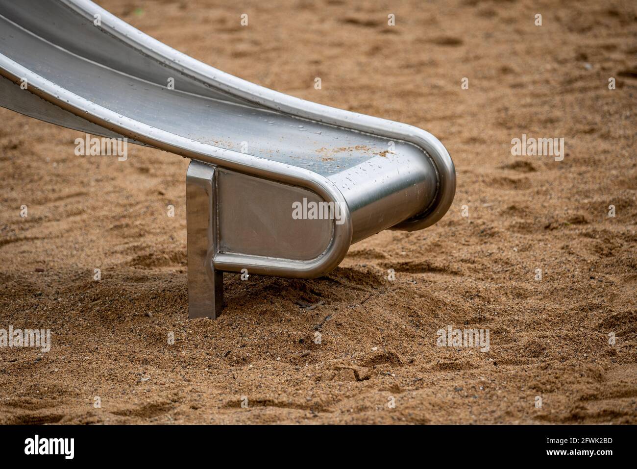 Slide playground rain hi-res stock photography and images - Alamy