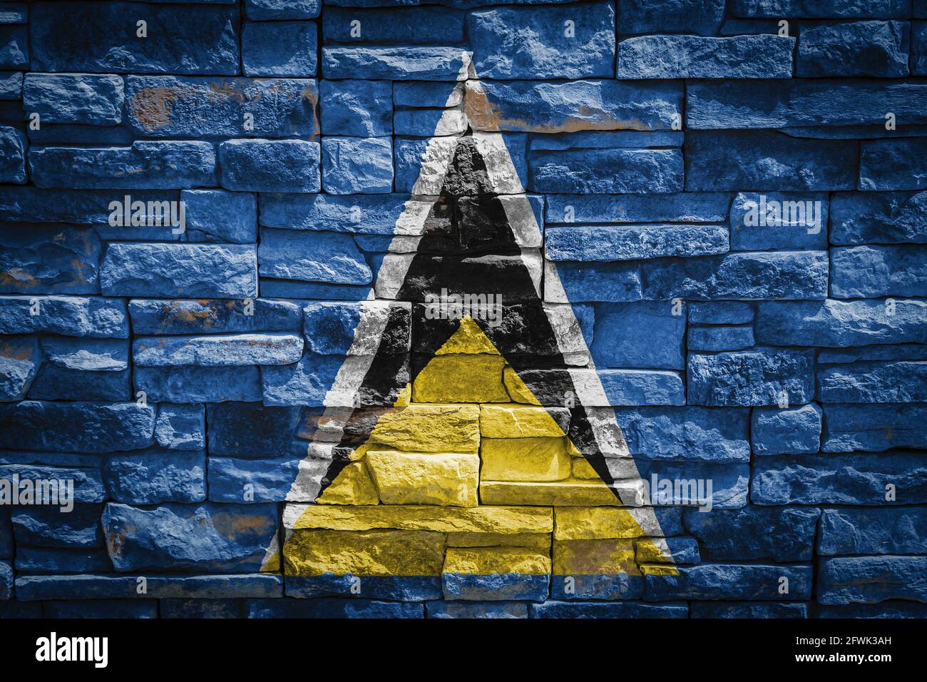 National flag of Saint Lucia on stone wall background.The concept of ...
