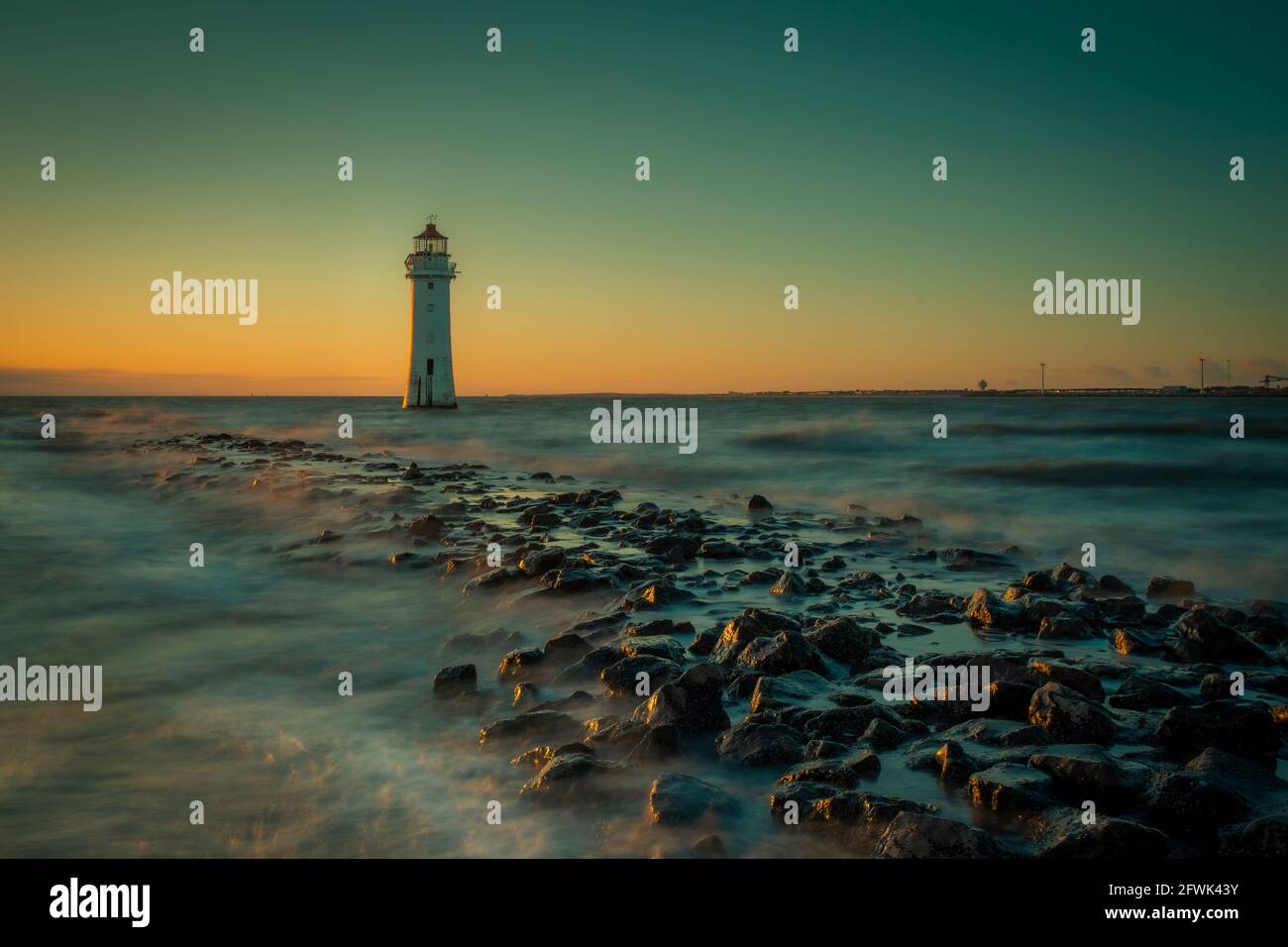 Perch Rock lighthouse at sunset, New Brighton, Wirral, Merseyside Stock ...