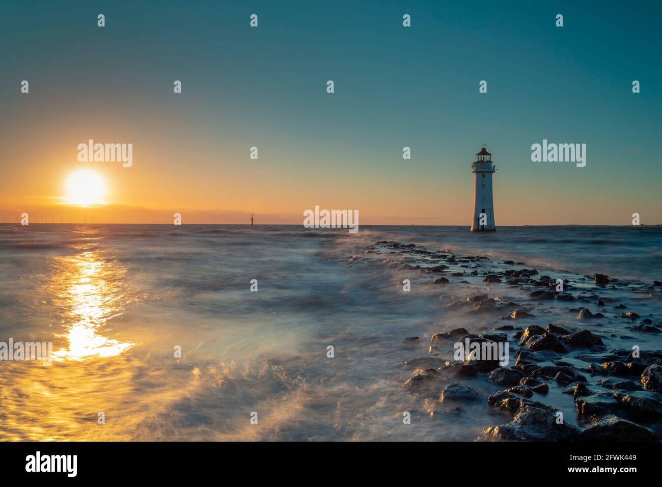 Perch Rock lighthouse at sunset, New Brighton, Wirral, Merseyside Stock ...