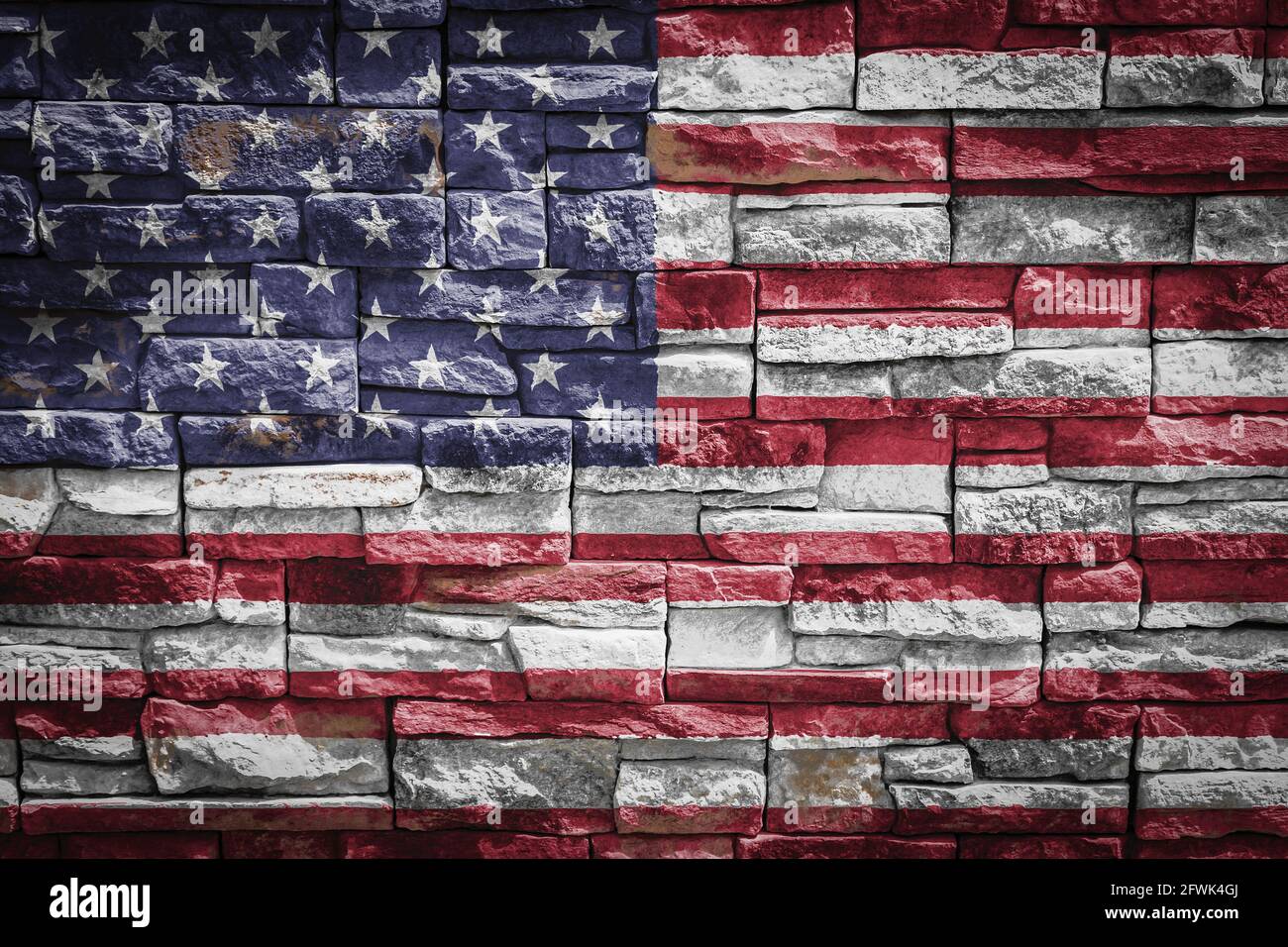 National flag of USA on stone wall background.The concept of national ...