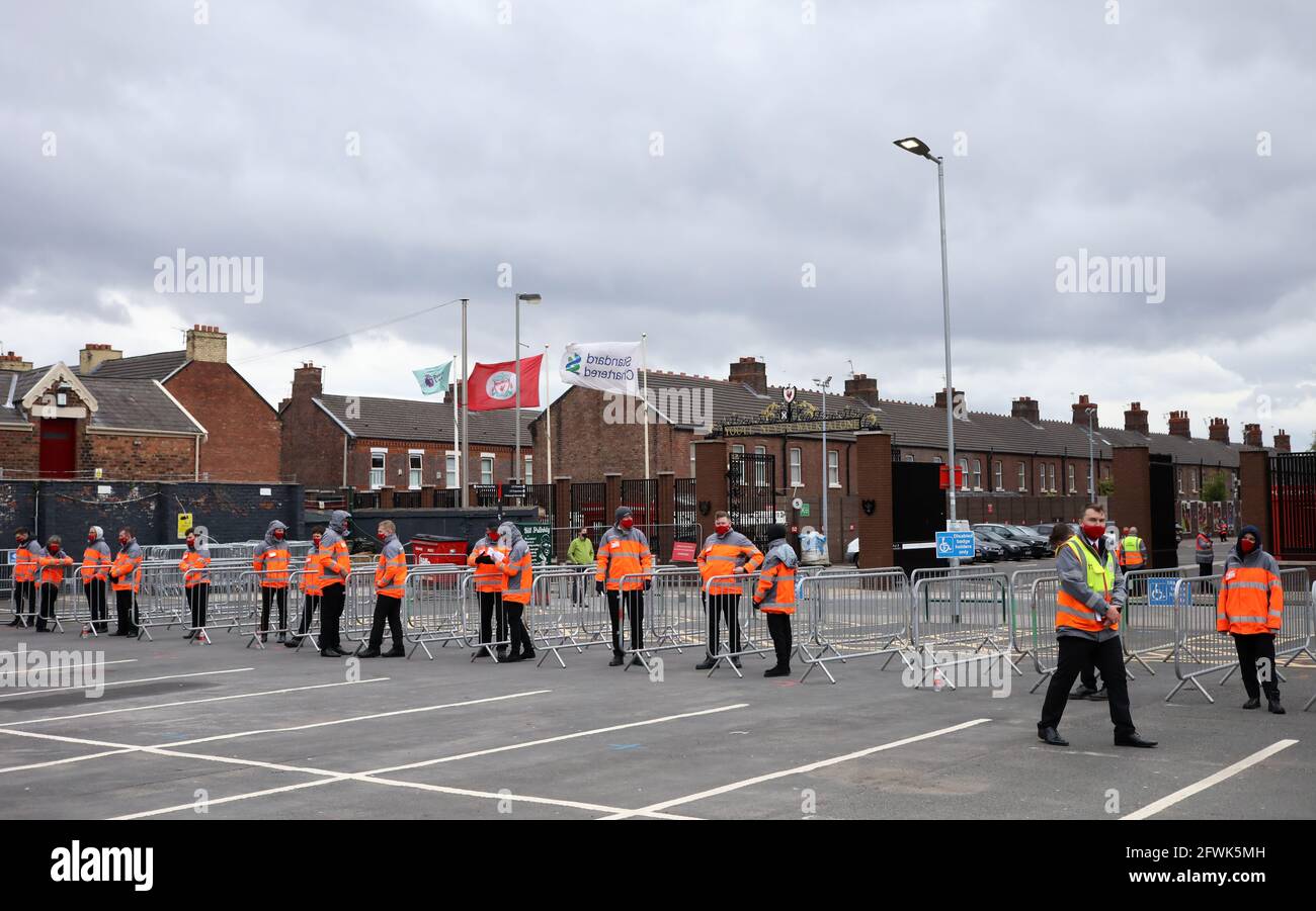 Stewards wait to welcome fans in before the Premier League match at ...