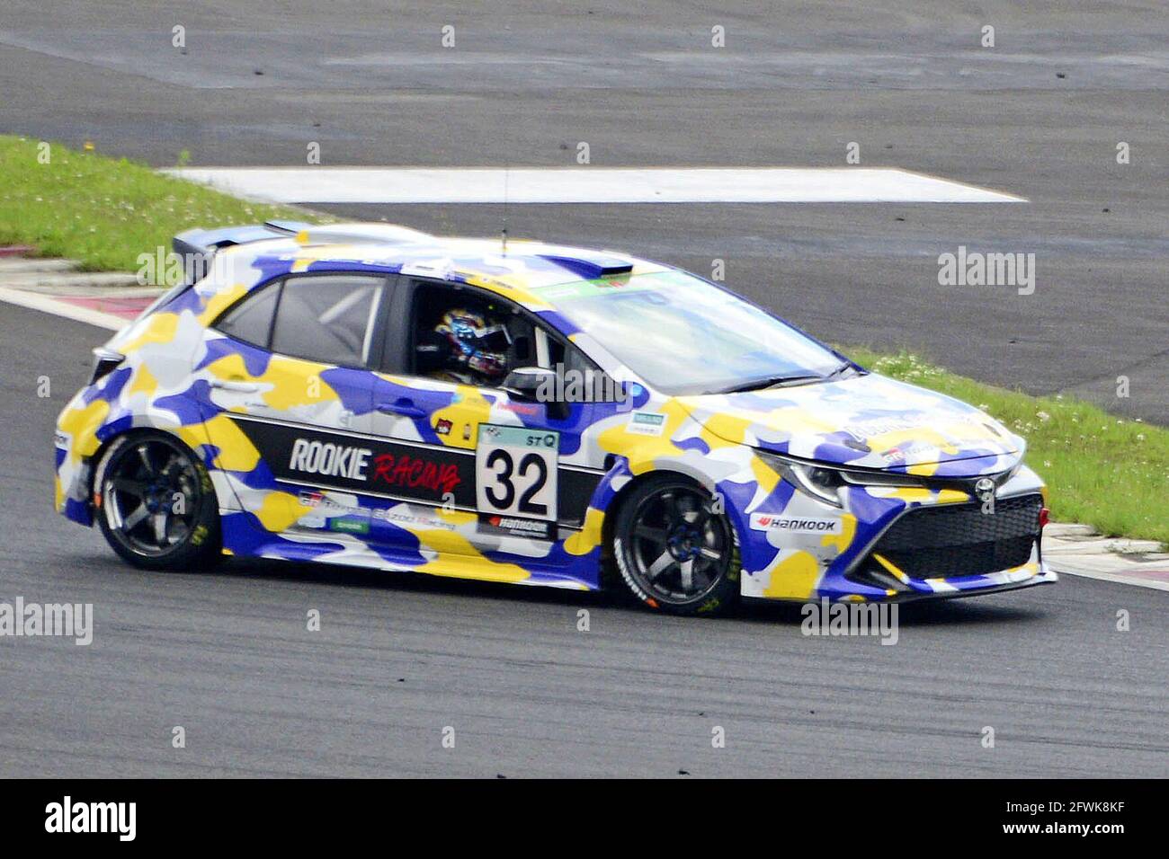 A hydrogen-powered racing car developed by Toyota Motor Corp. runs in a ...