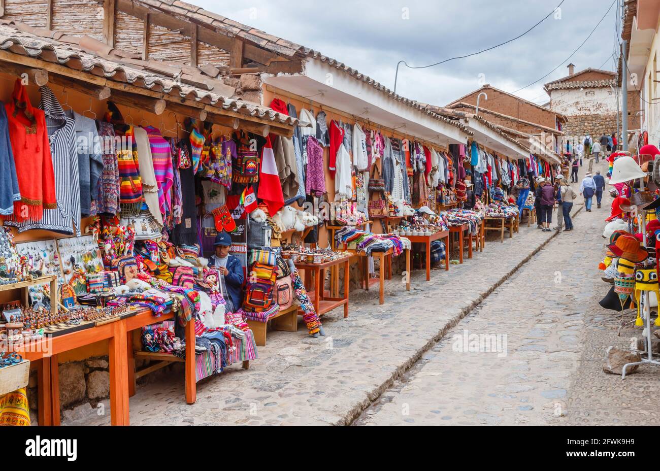 Street scene with tourist souvenir shops in Chinchero, a small Andean ...