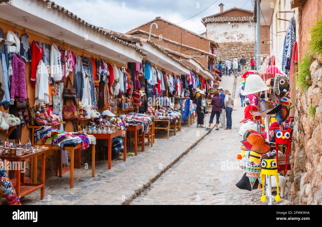 Street scene with tourist souvenir shops in Chinchero, a small Andean ...