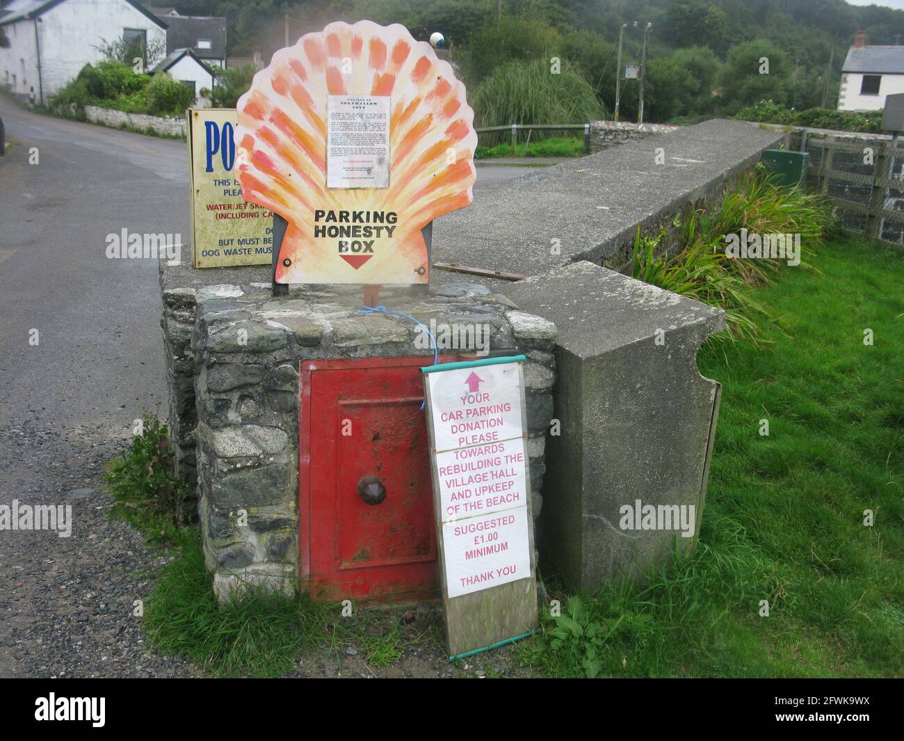 Car parking honesty box giant shell sign. Porthallow village. South ...