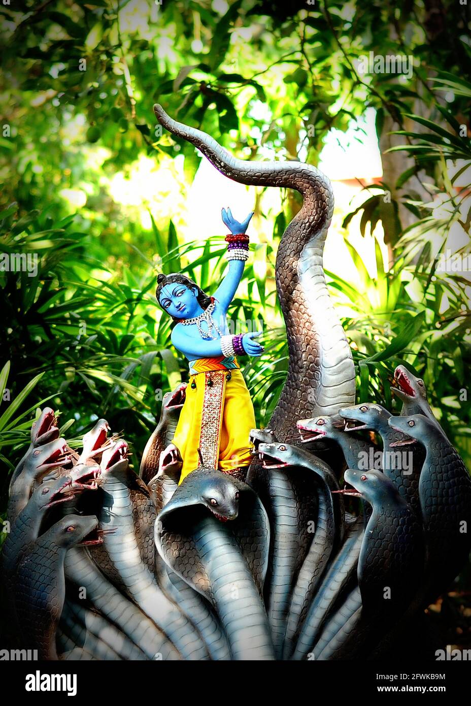 Lord Krishna dancing on huge snakes head Stock Photo - Alamy