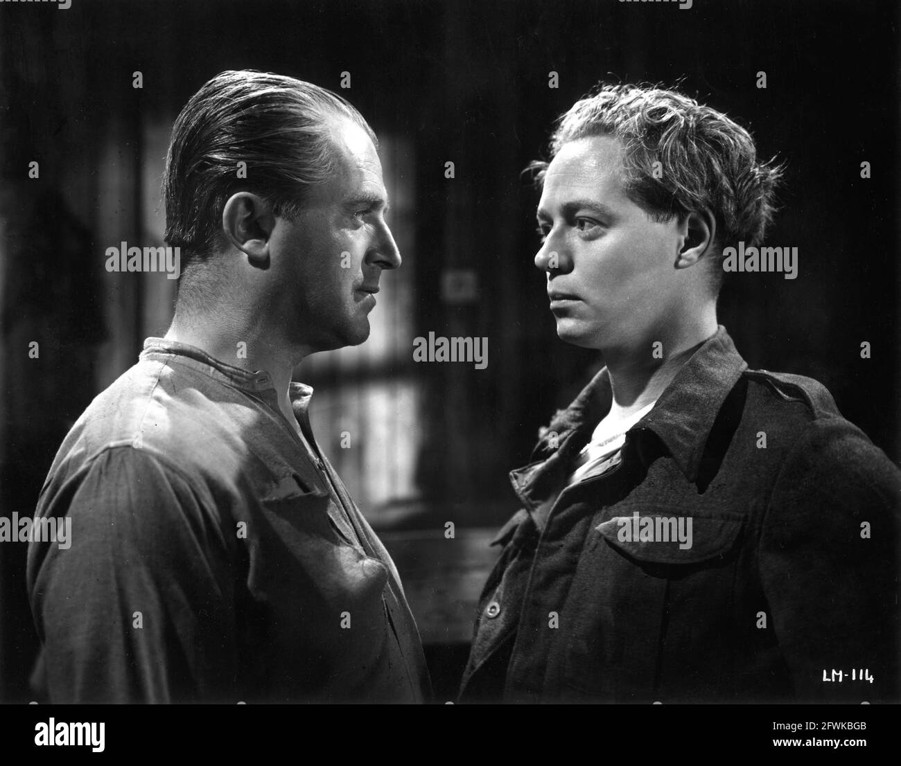 JACK WARNER and JIMMY HANLEY in THE CAPTIVE HEART 1946 director BASIL ...