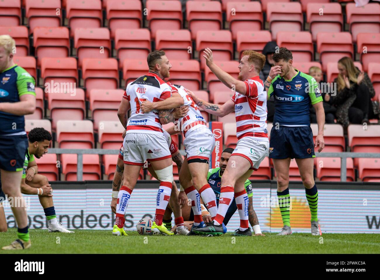 Lewis Tierney (5) of Leigh Centurions celebrates scoring a try with his ...