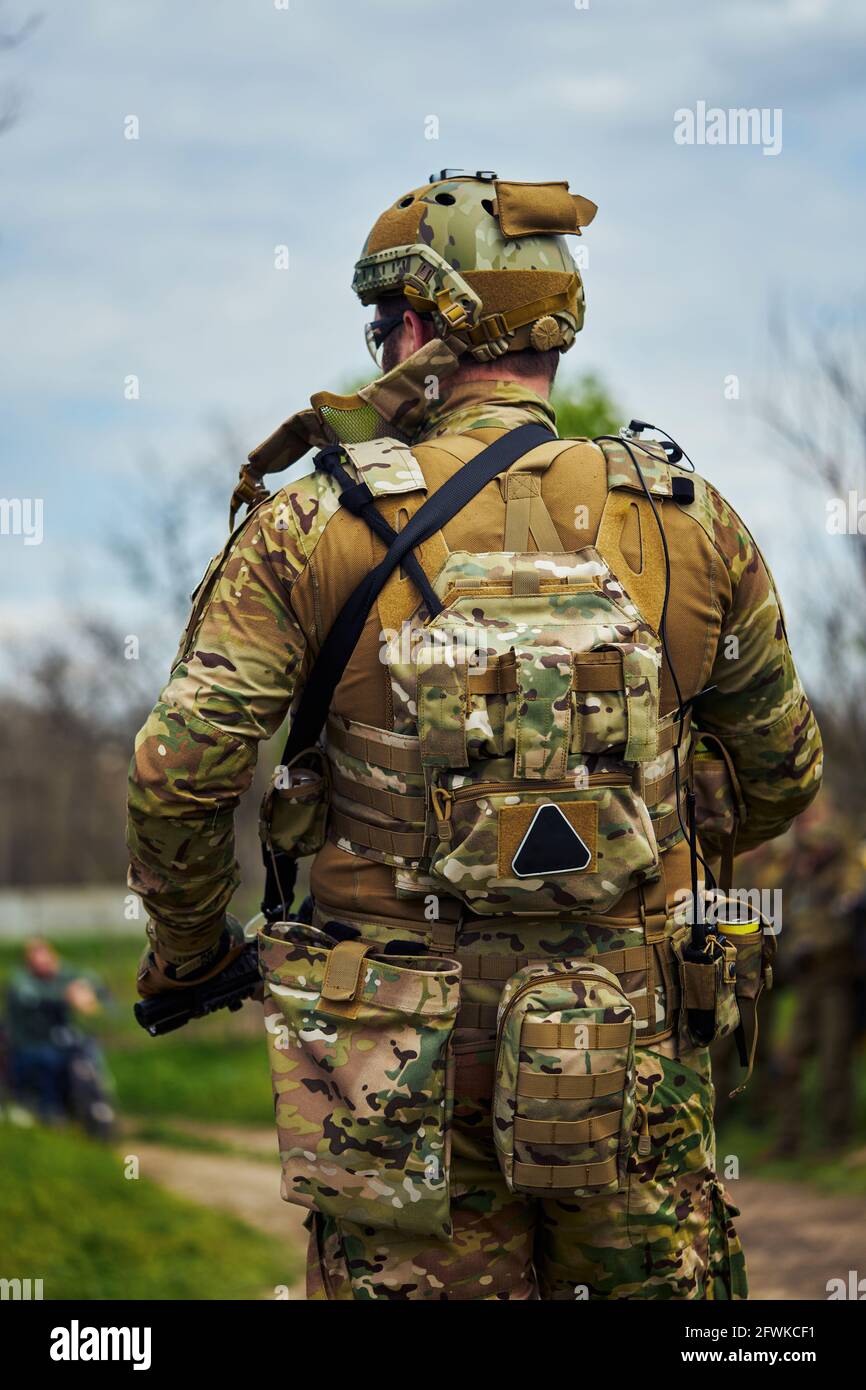 Close-up rear view of soldier in military uniform Stock Photo - Alamy