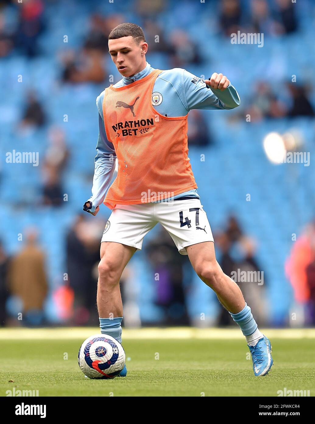 Manchester City's Phil Foden warms up before the Premier League match ...