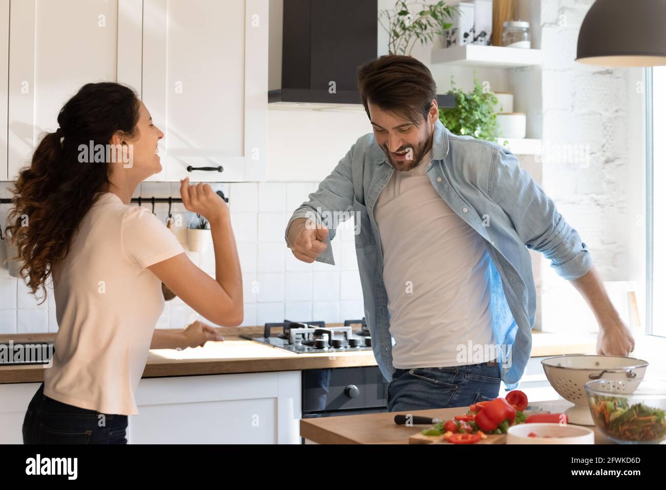Dancing together in kitchen hi-res stock photography and images - Alamy
