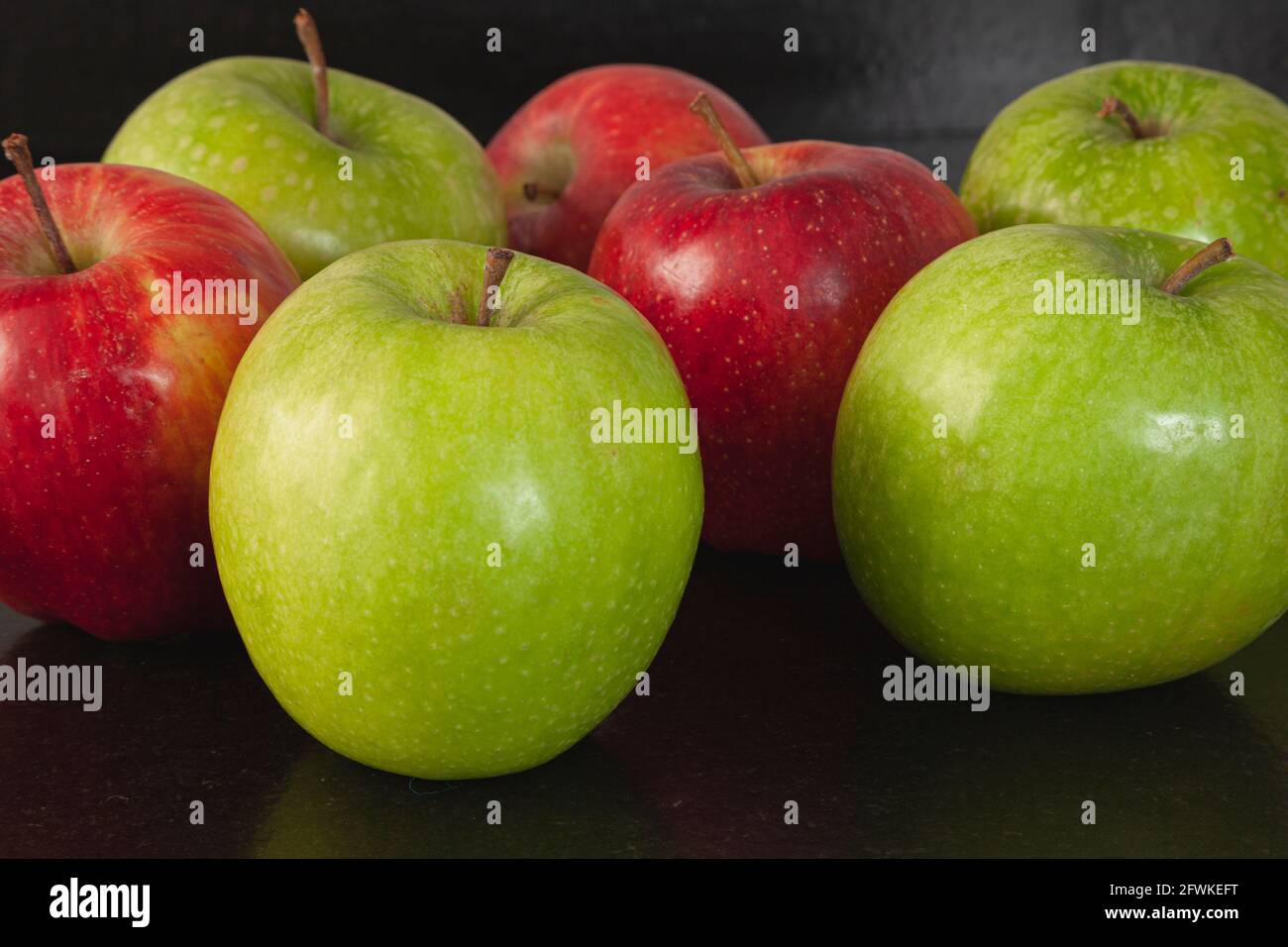 Several apples, some of them are green and some of them are red. They ...