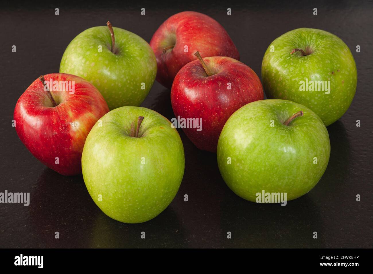 Several apples, some of them are green and some of them are red. They ...